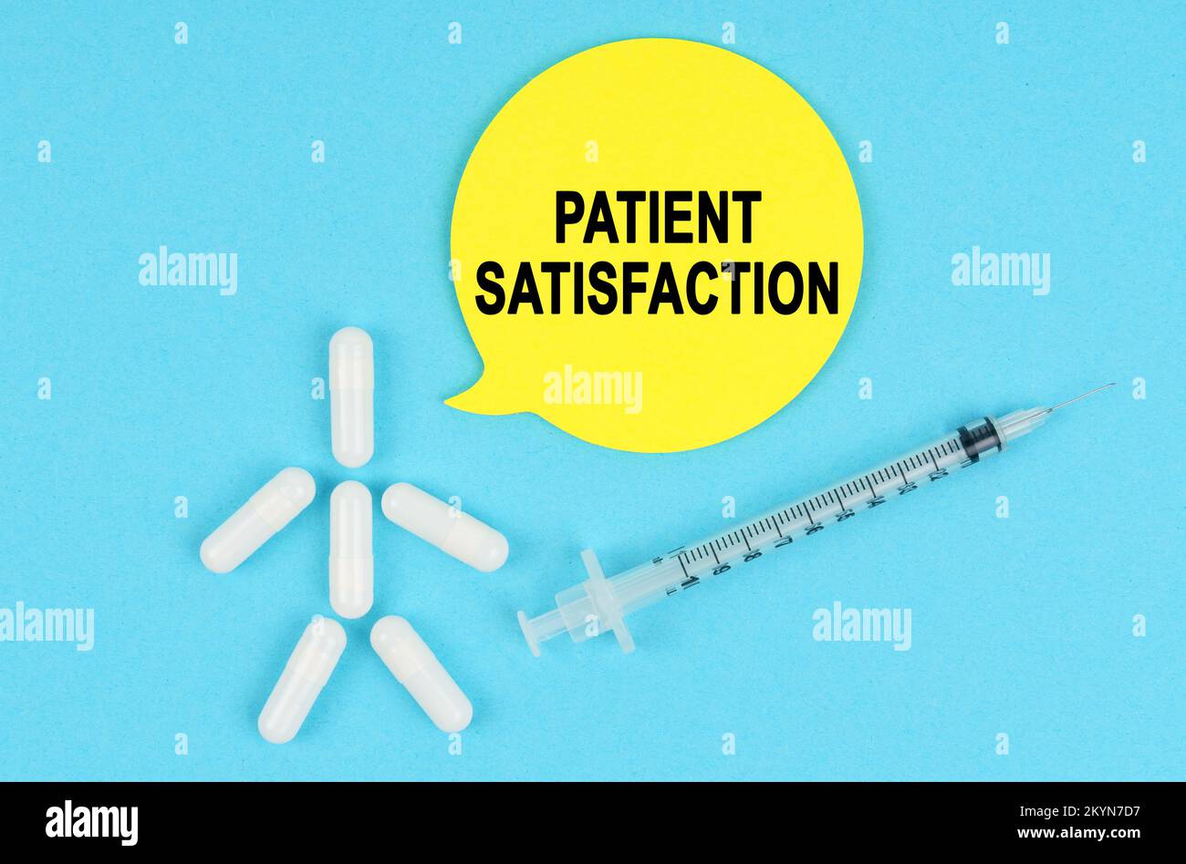 Medicine and health concept. Syringe, human figure made of pills and ...