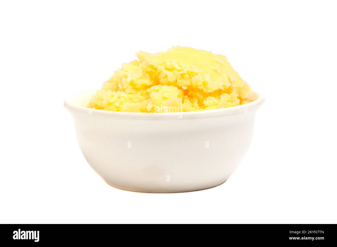 Ghee in bowl isolated on white background Stock Photo - Alamy