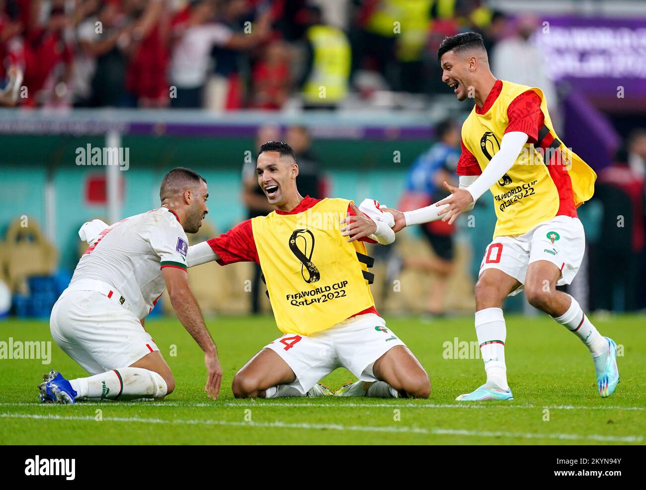 Morocco's Badr Benoun (centre) celebrates with his team-mates on the ...