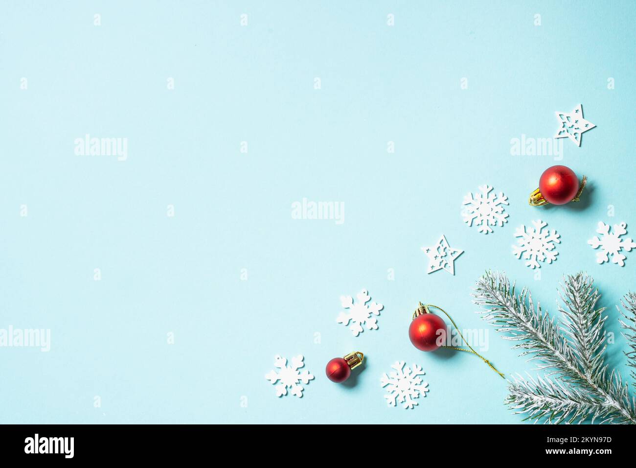 Christmas composition with holiday decorations on blue Stock Photo - Alamy