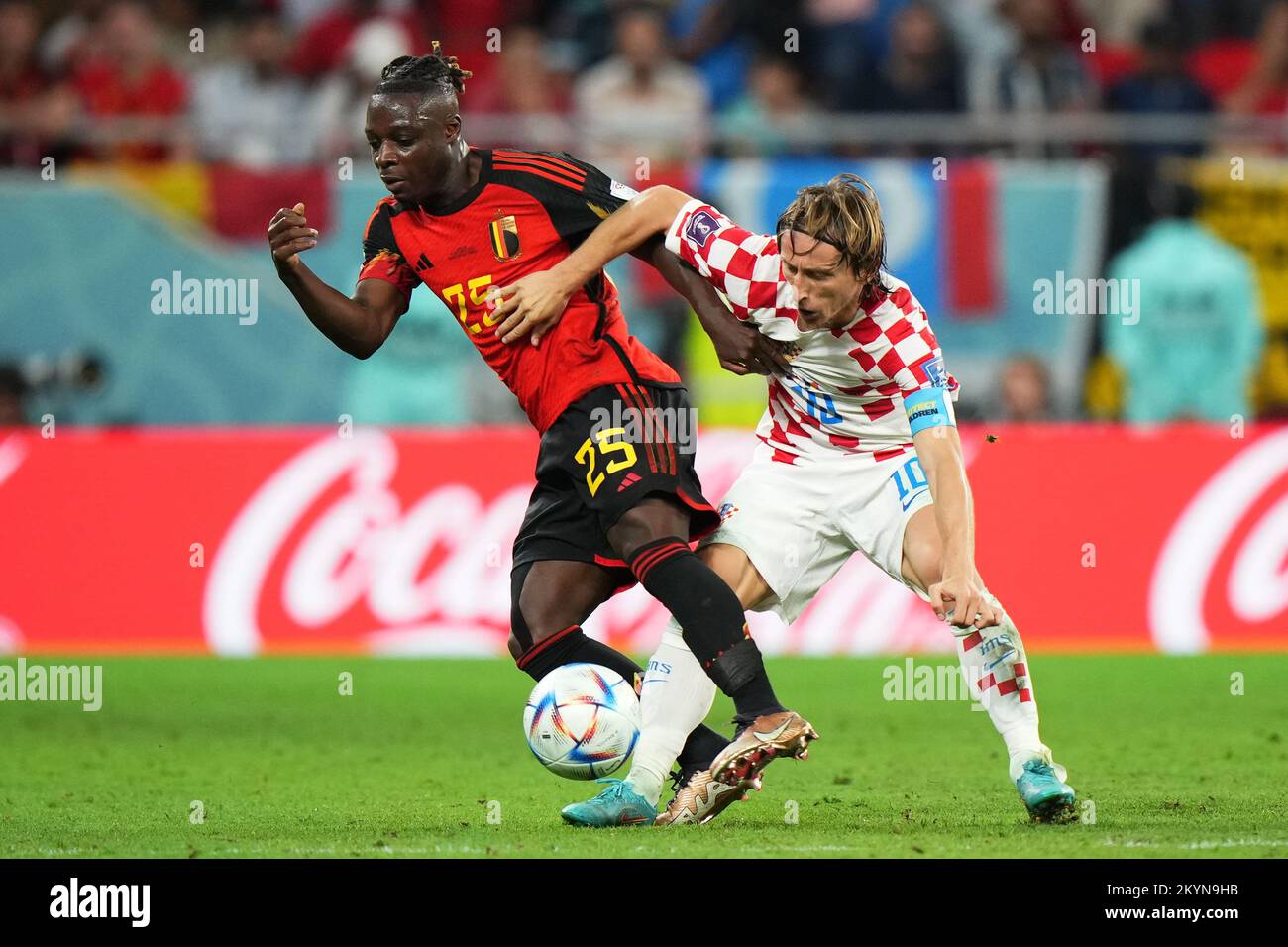 Jeremy Doku of Belgium and Luka Modric of Croatia during the FIFA World ...