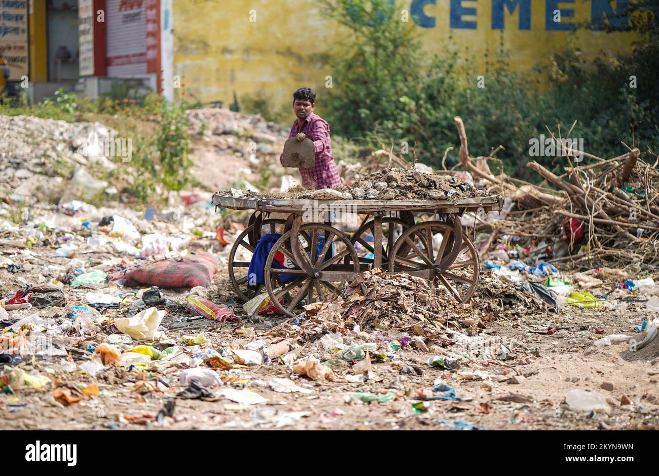 Man cleaning dumping area, municipality worker, cleaning staff ...