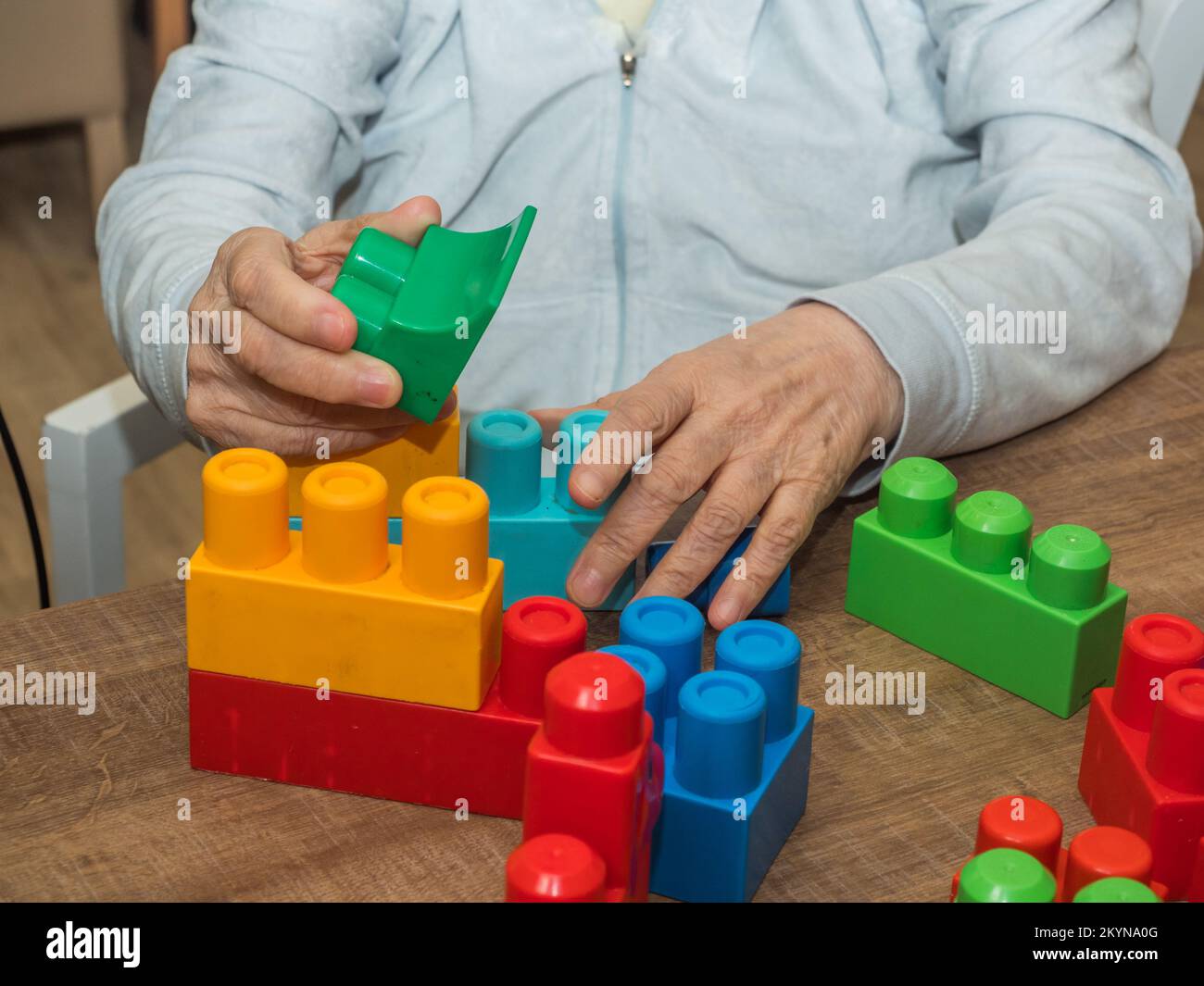 Senior activity concept. Exercises by building spatial figures from ...