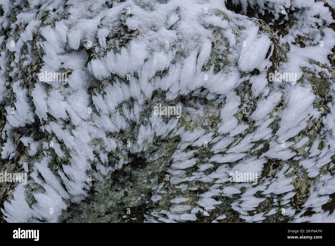 Ice frost on stone texture. Winter abstract background. Snow surface ...