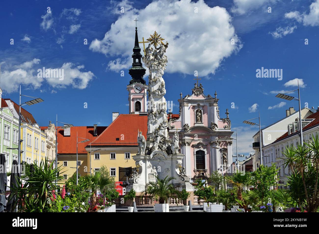 Franciscan church and Holy Trinity statue in St Polten, Austria Stock ...