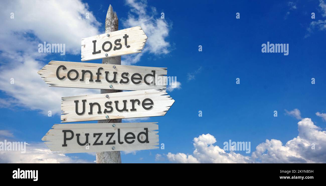 Lost, confused, unsure, puzzled - wooden signpost with four arrows ...