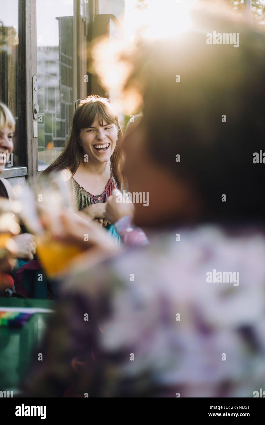 Cheerful transgender woman enjoying with non-binary friend Stock Photo ...