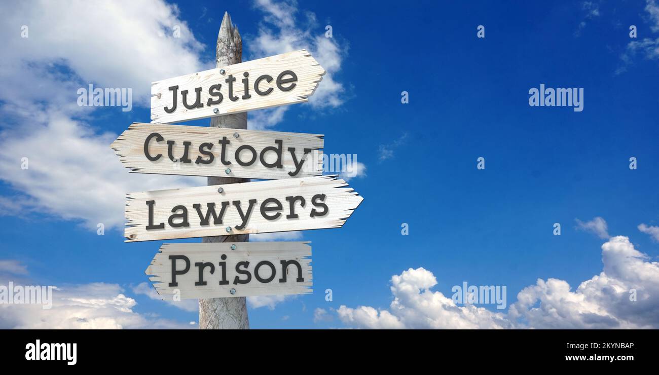 Justice, custody, lawyers, prison - wooden signpost with four arrows ...