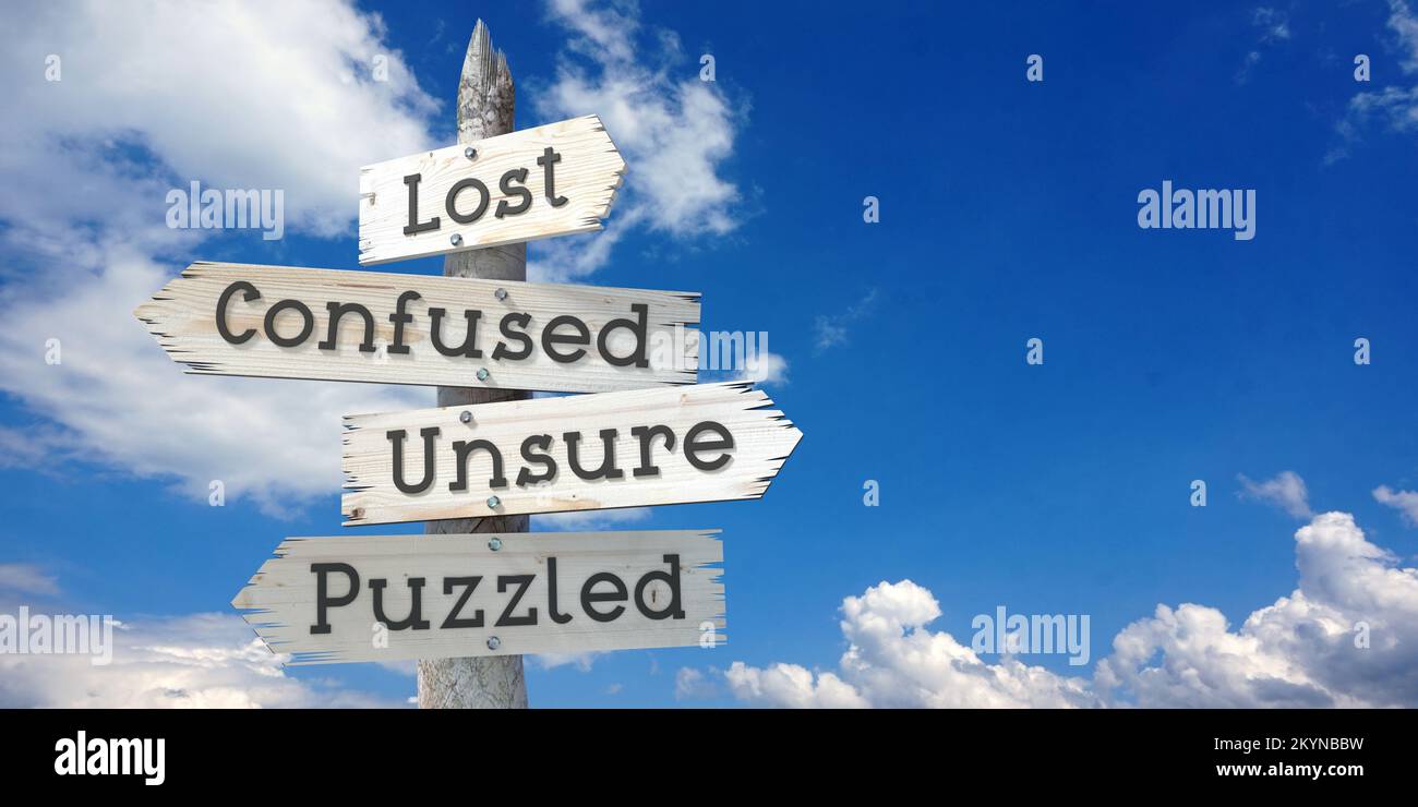 Lost, confused, unsure, puzzled - wooden signpost with four arrows ...