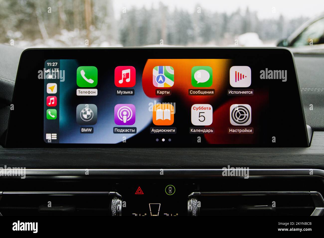 MOSCOW, RUSSIA - FEBRUARY 05, 2022 Car media close up view. CarPlay on ...