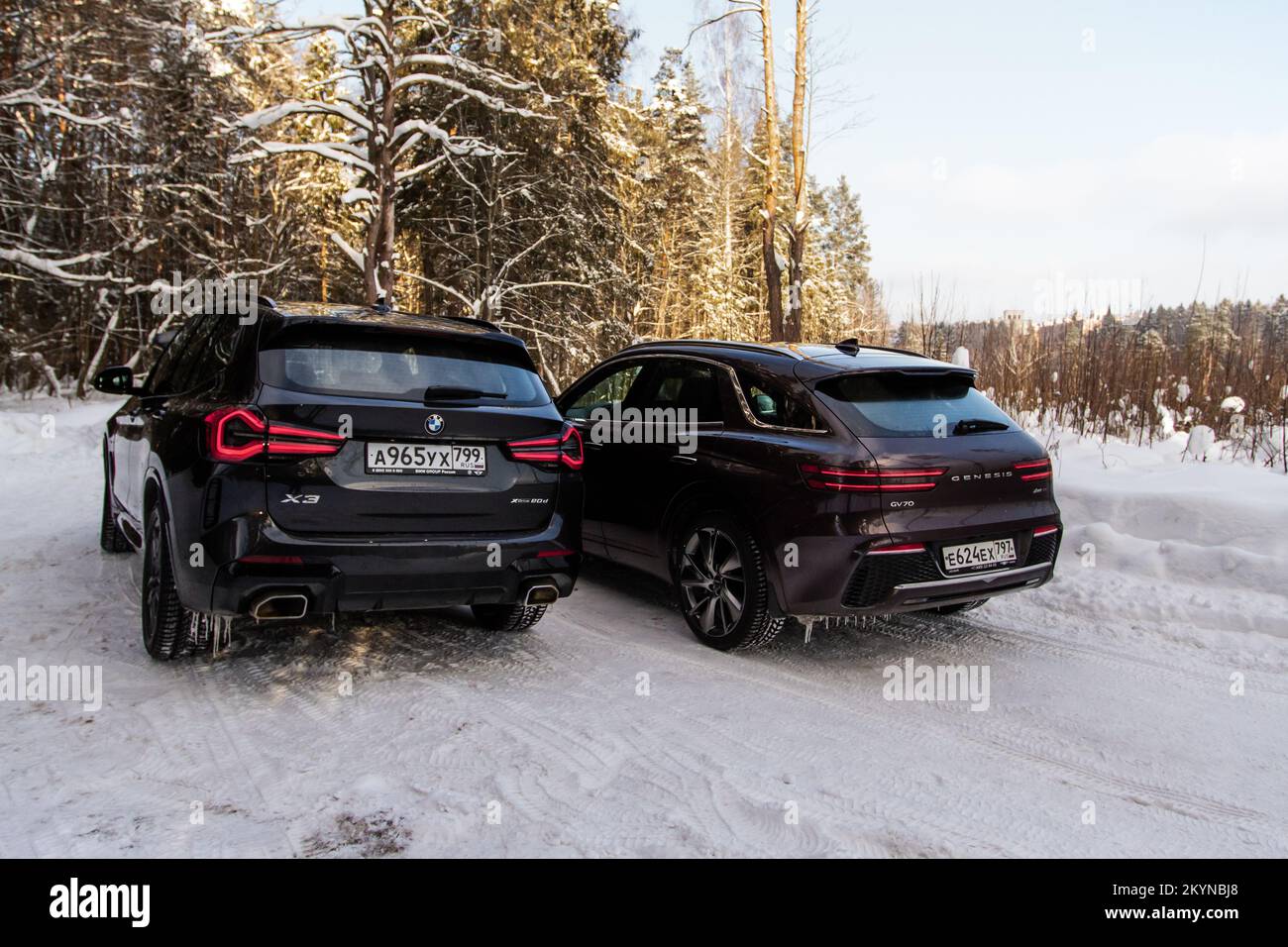 MOSCOW, RUSSIA - FEBRUARY 05, 2022 BMW X3 (G01) and Genesis GV70 (JK1 ...