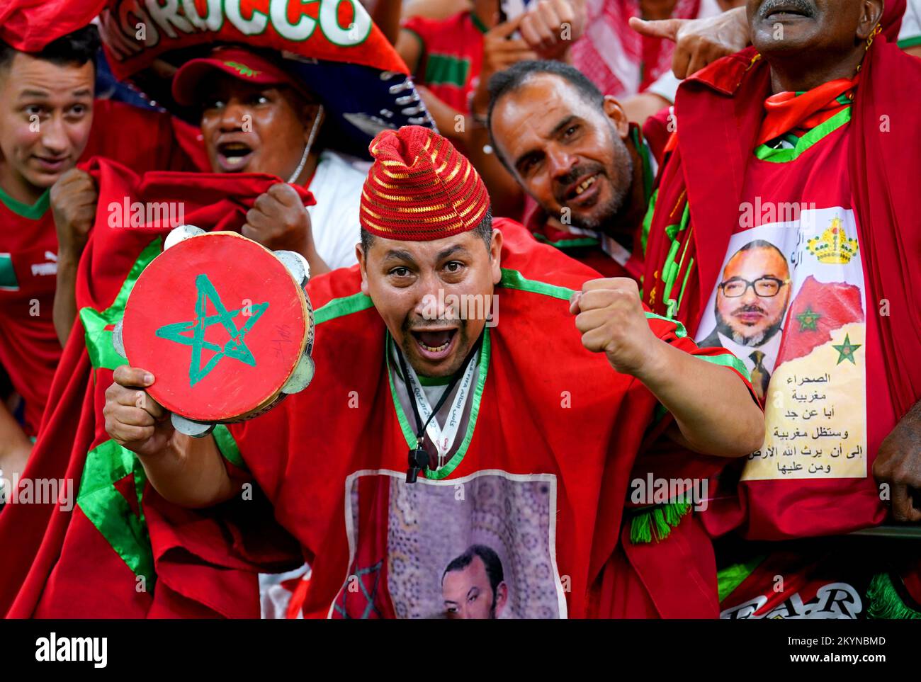Morocco fans celebrate at the end of the FIFA World Cup Group F match at the Al Thumama Stadium ...