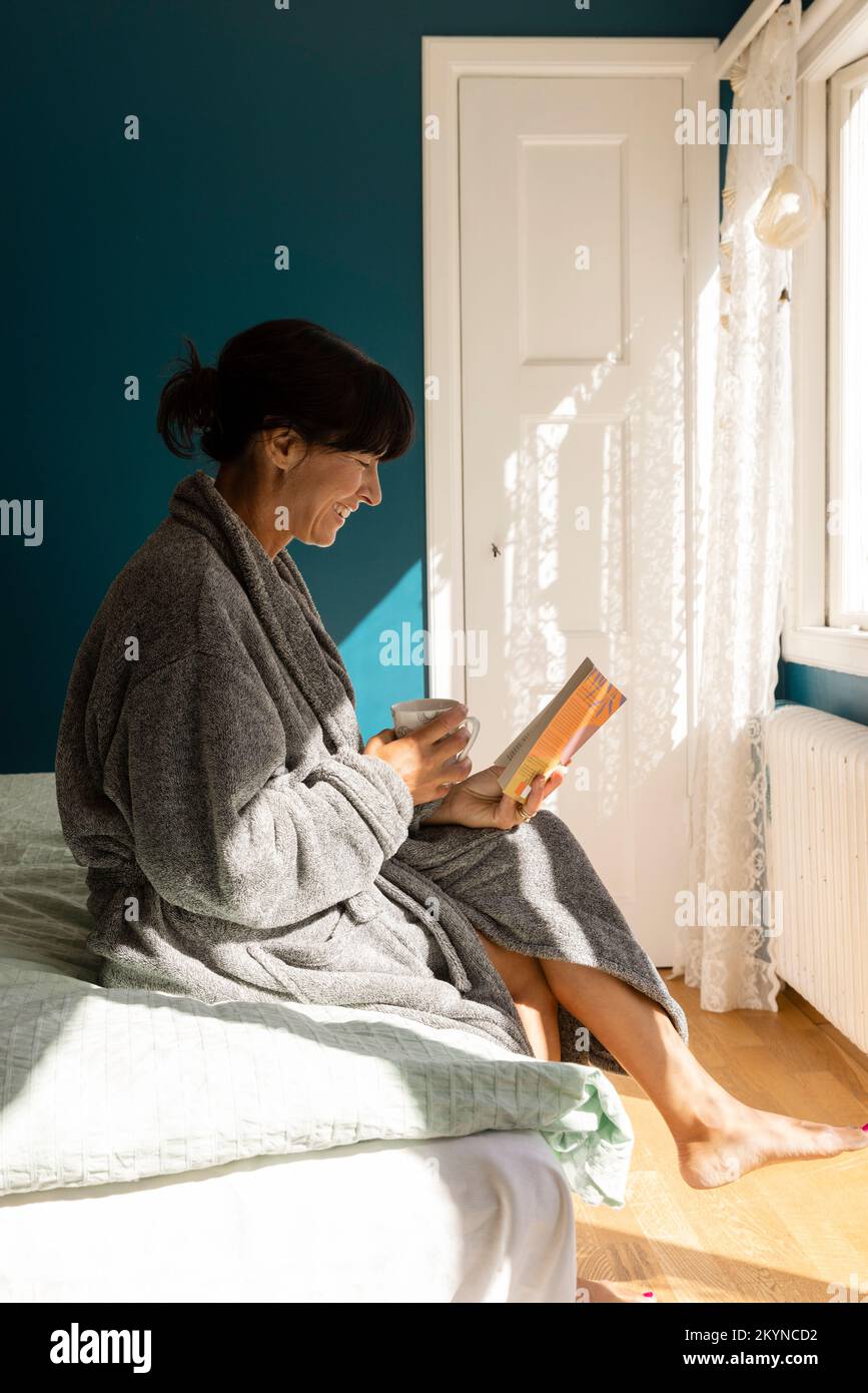 Mature woman in bed hi-res stock photography and images - Alamy