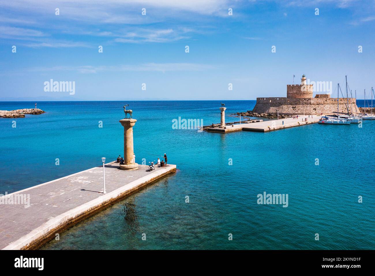 Mandraki port with deers statue, where The Colossus was standing and ...
