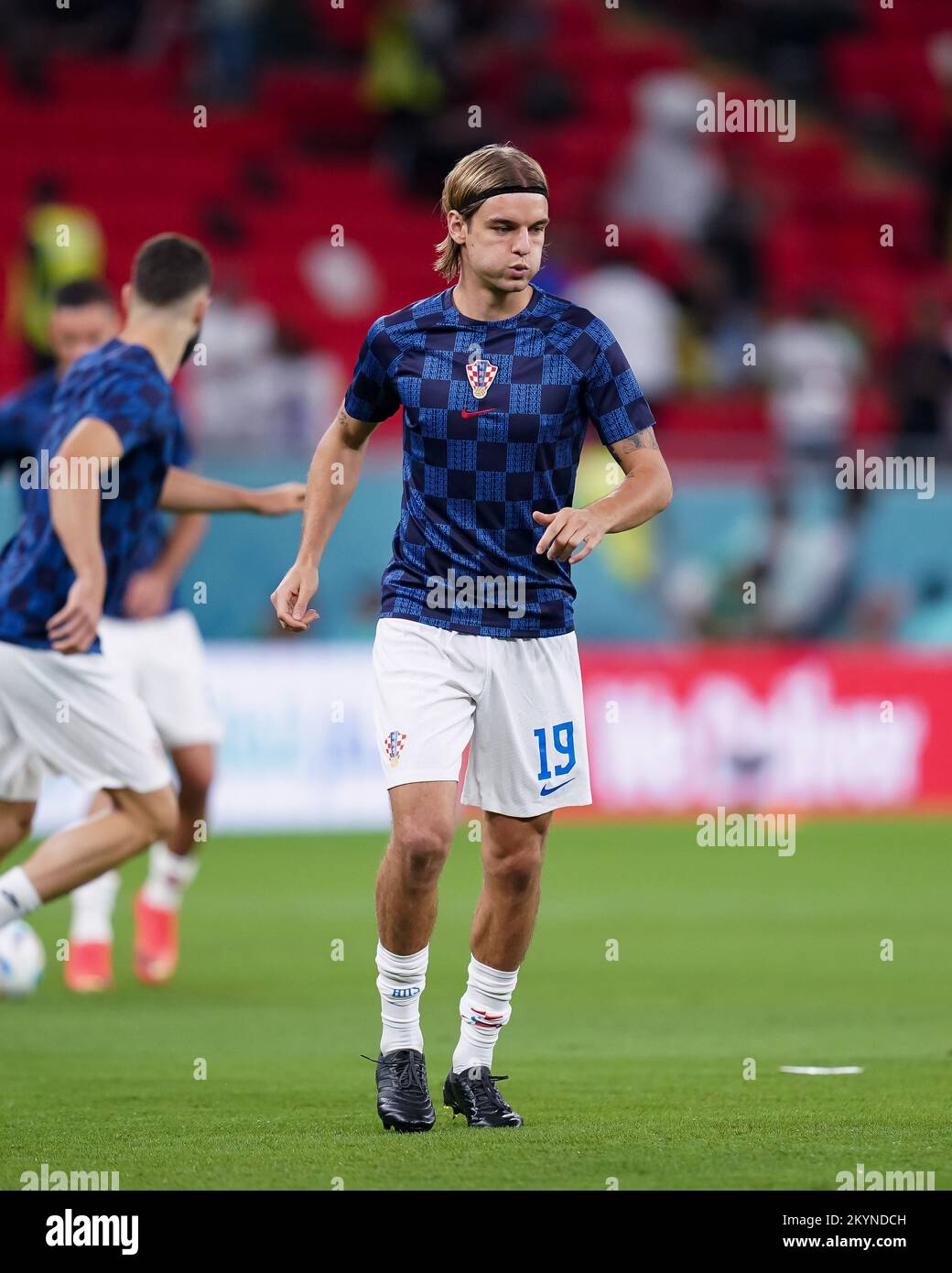 DOHA, QATAR - DECEMBER 1: Player of Croatia Borna Sosa warms up before ...