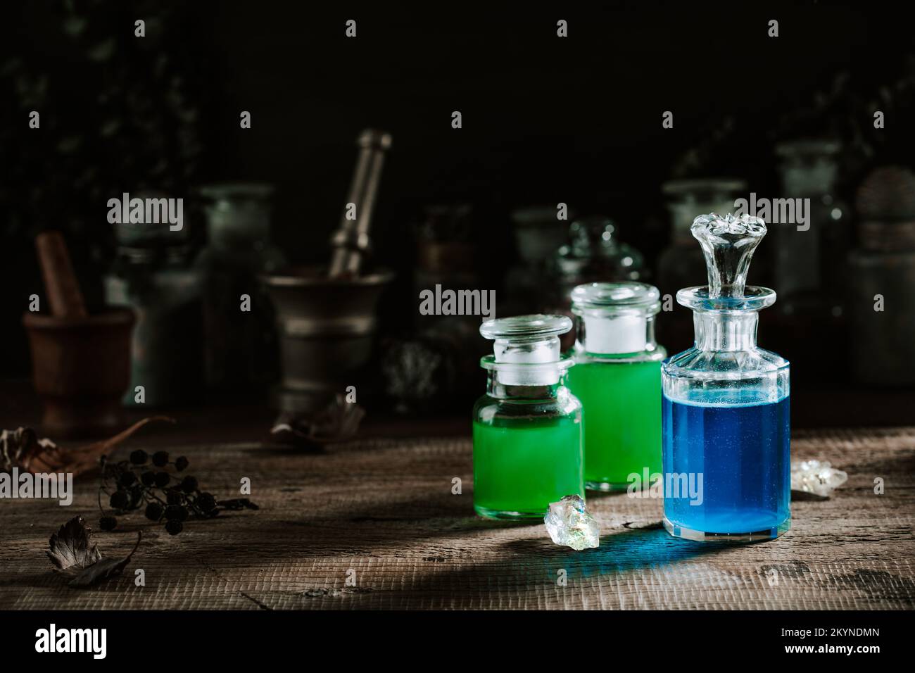 Witchcraft still life concept with potion, herbs ingredients and ...