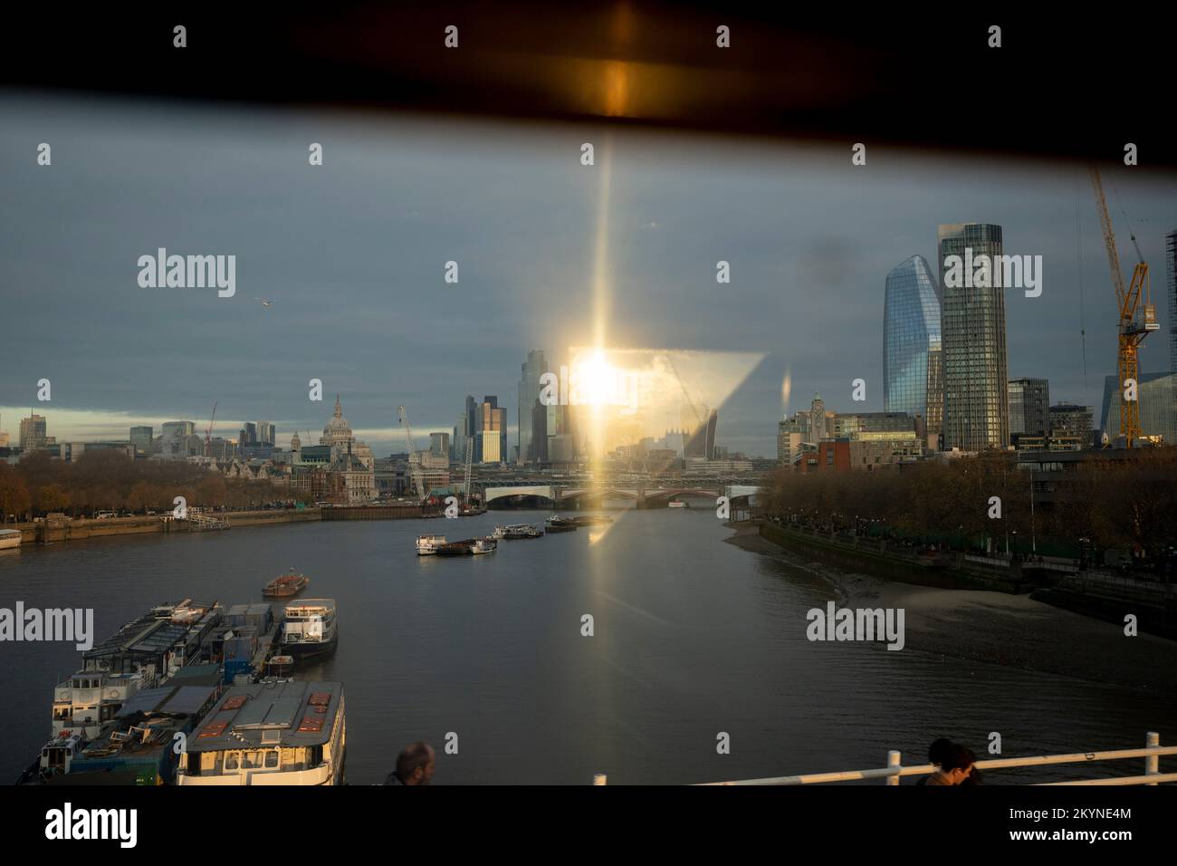 Seen from the top deck of a London bus that is driving over the river ...
