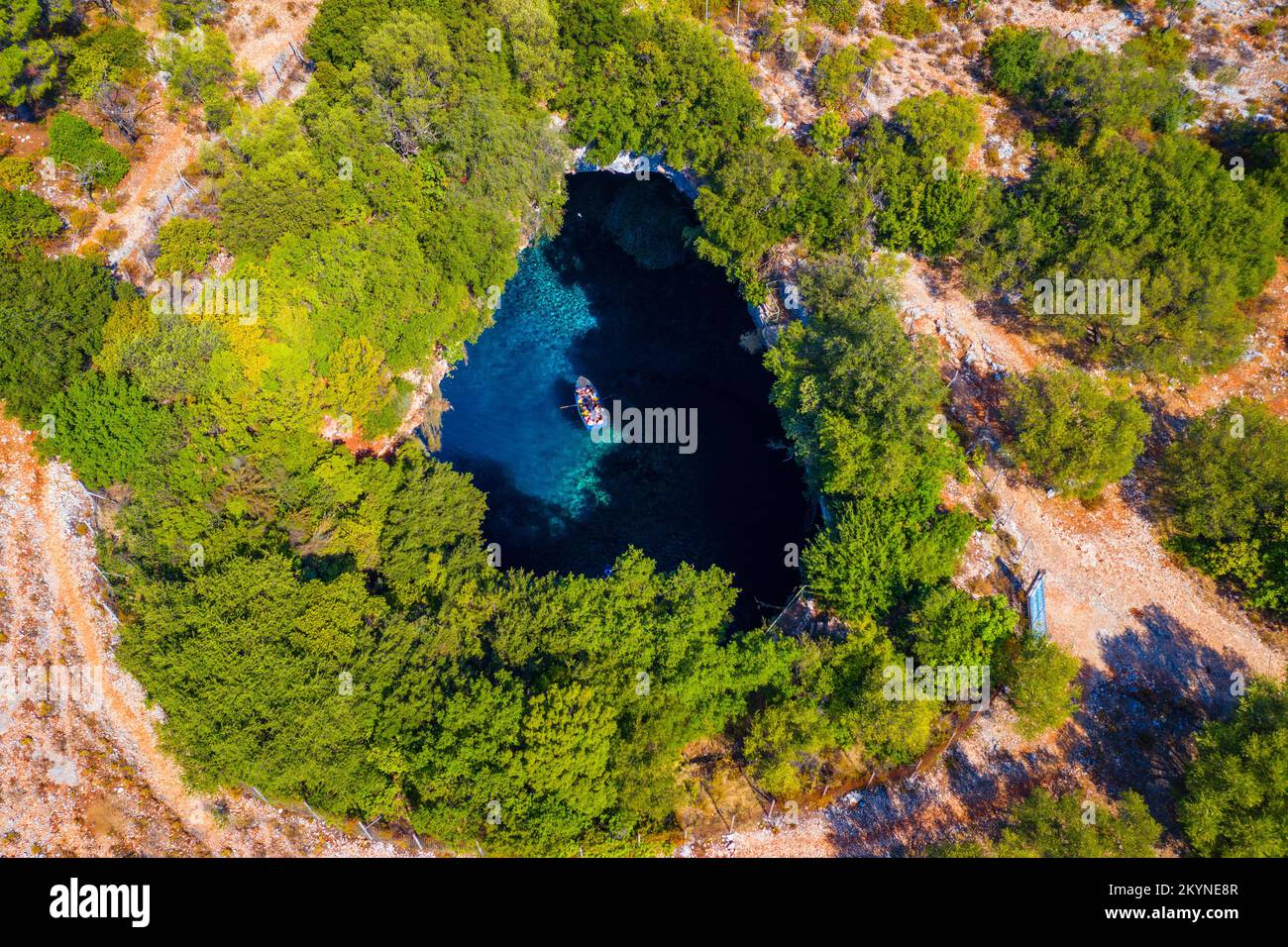 Famous Melissani lake on Kefalonia island, Karavomylos, Greece. On top ...