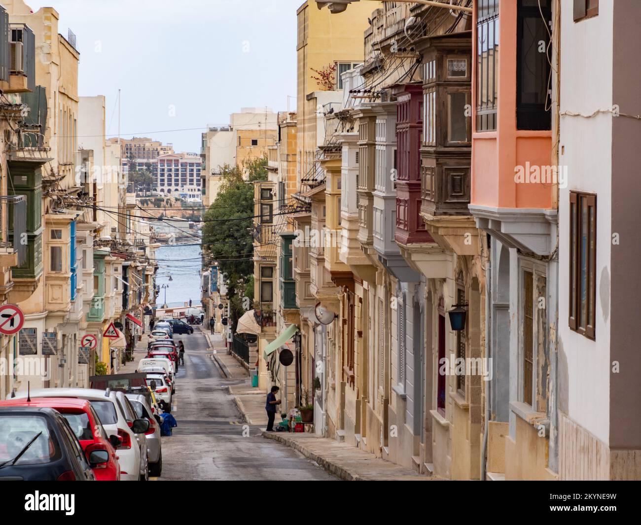 Sliema, Malta - May, 2021: Narrow street and historic sand-colored ...