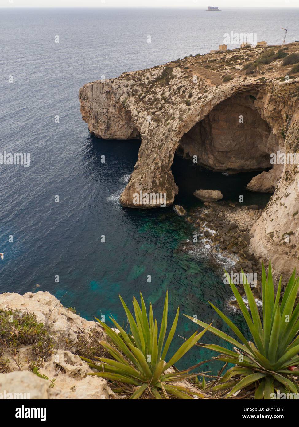 View for blue sea water and beautiful limestone arch and sea cave ...
