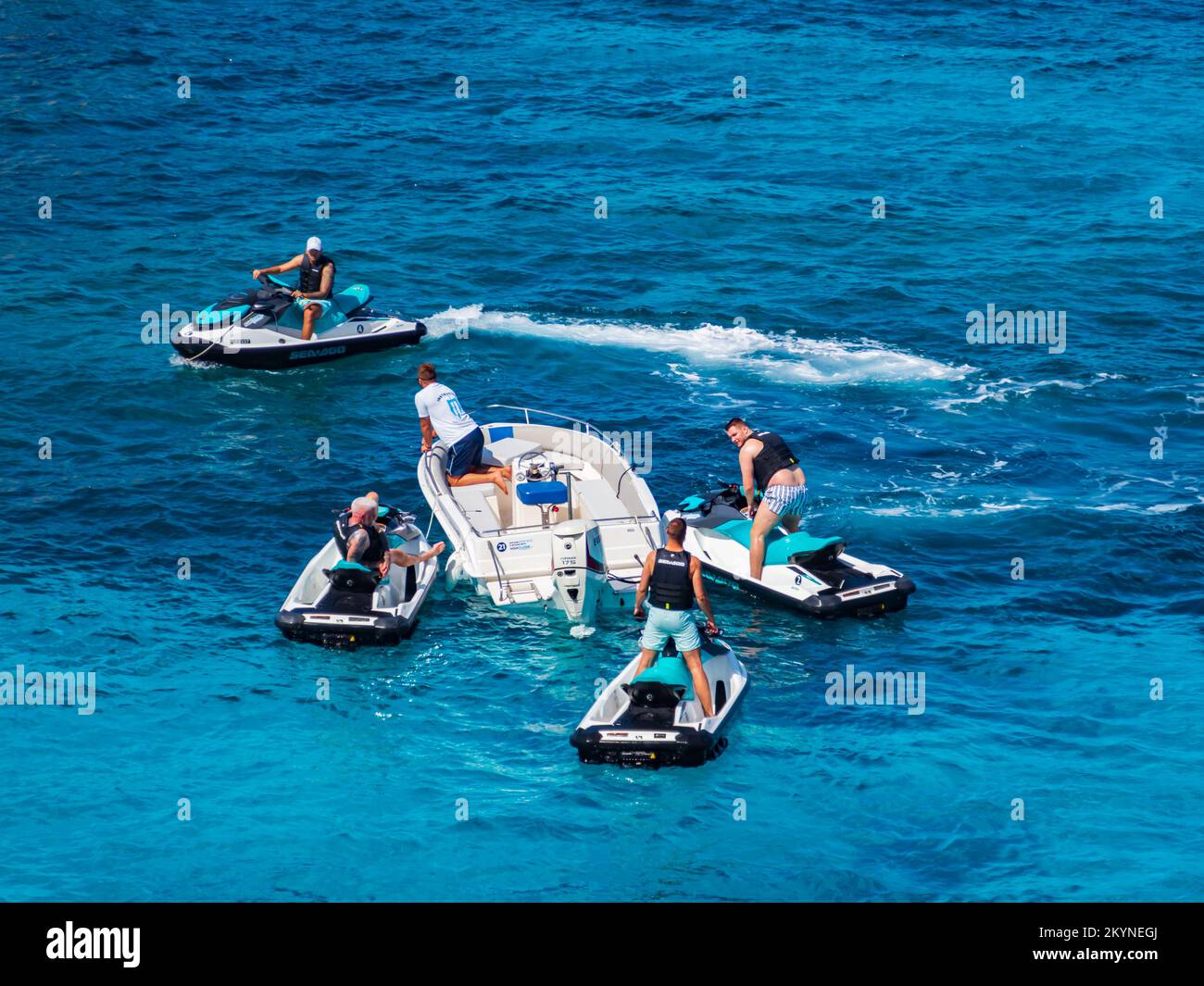 Blue Lagoon, Malta - May 2021: Boats in the azure clear waters of the ...