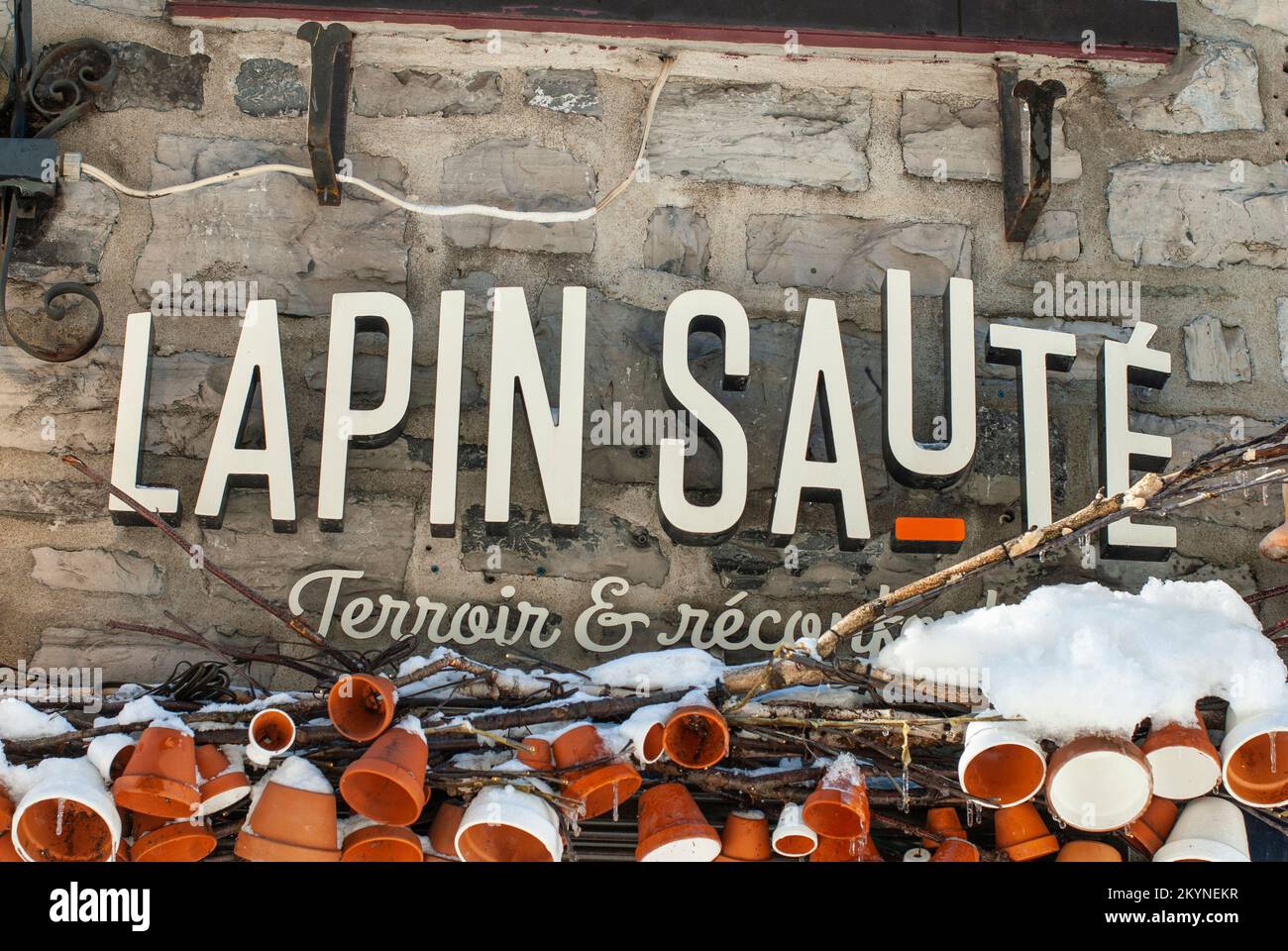 Lapin Saute restaurant sign in Petit Champlain, Quebec City Stock Photo ...