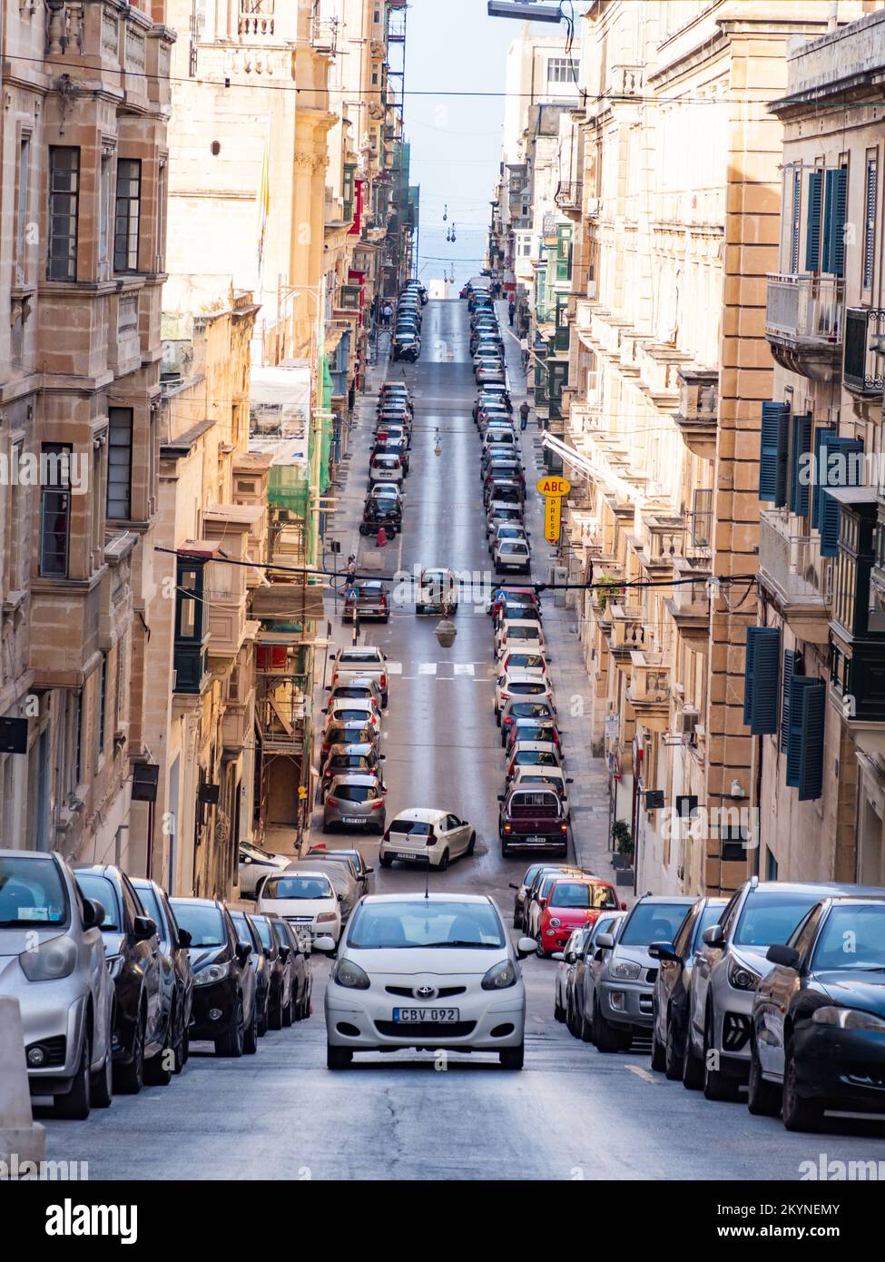 Valletta, Malta - May, 2021: Narrow streets and historic sand-colored ...