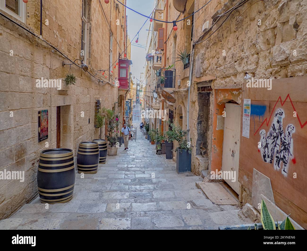Valletta, Malta - May, 2021: Narrow streets and historic sand-colored ...