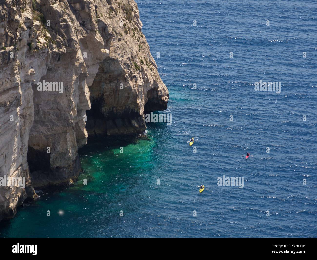 View for blue sea water and beautiful limestone arch and sea cave ...