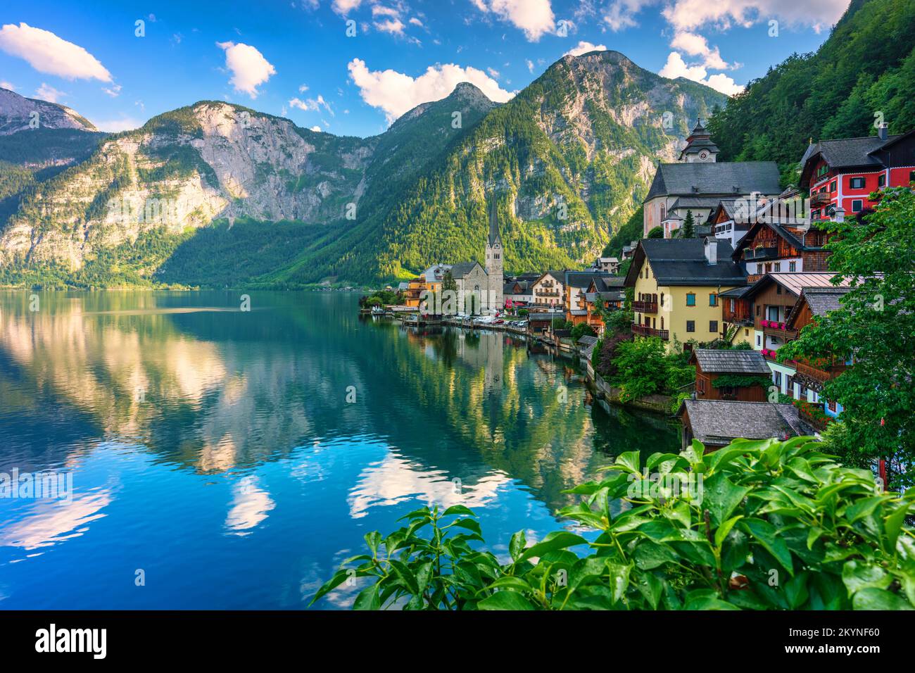 Scenic picture-postcard view of famous Hallstatt mountain village in ...