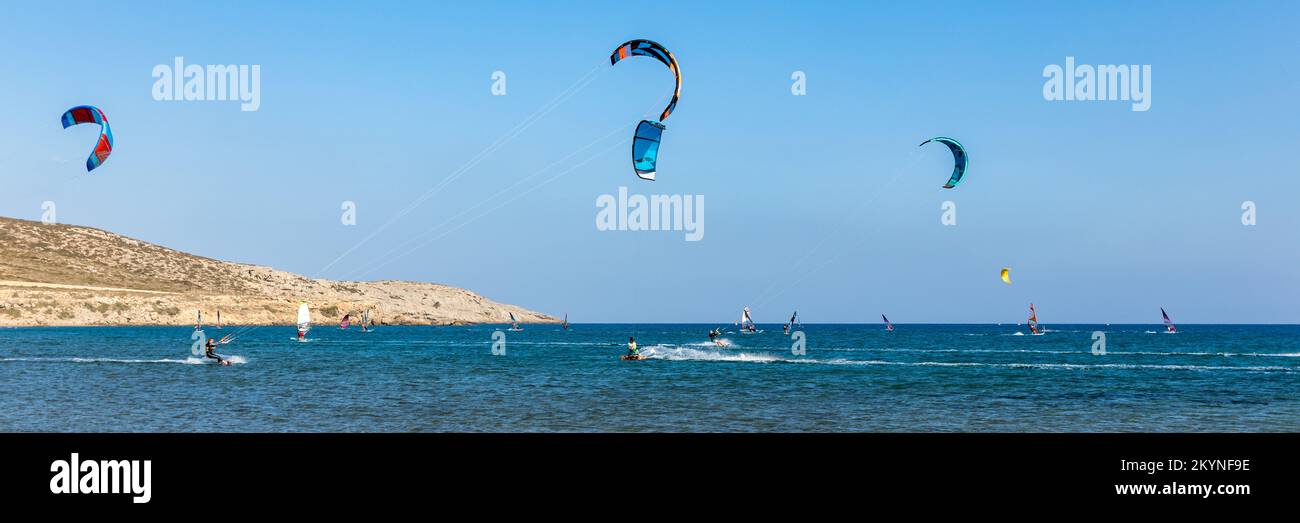 Surfers in Prasonisi Beach in Rhodes island, Greece. Kiteboarder ...