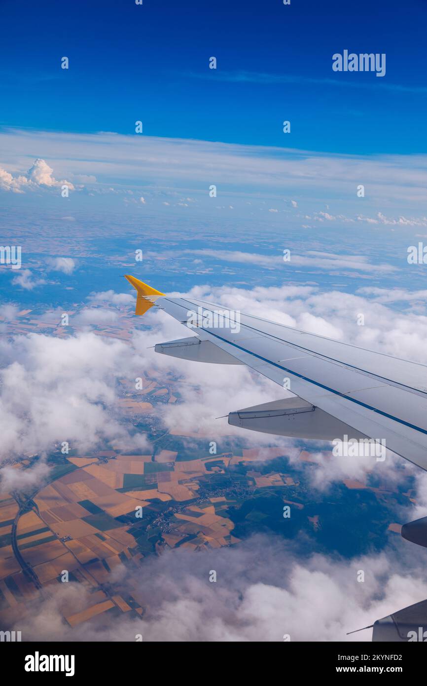 Airplane windows view above the earth on landmark down. View from an ...