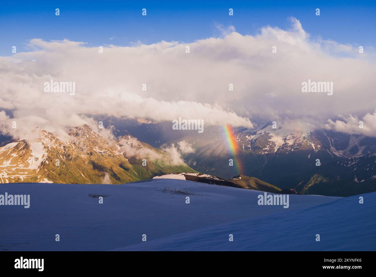 Rainbow in the mountain valley after the rain Stock Photo - Alamy