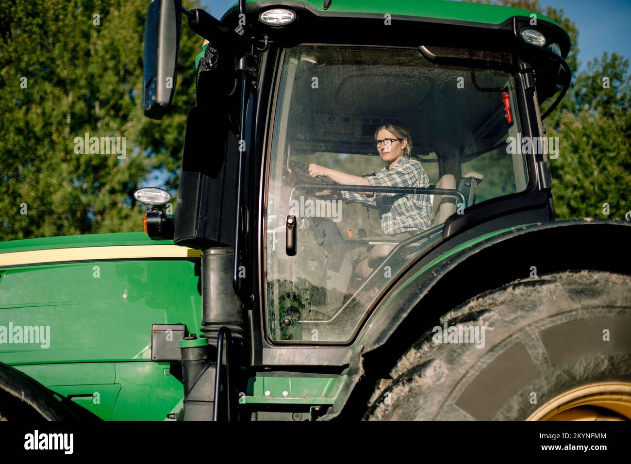 Female and tractor hi-res stock photography and images - Alamy