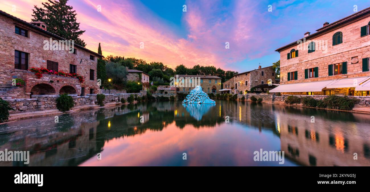 Thermal bath town of Bagno Vignoni, Italy during sunrise. Old thermal ...