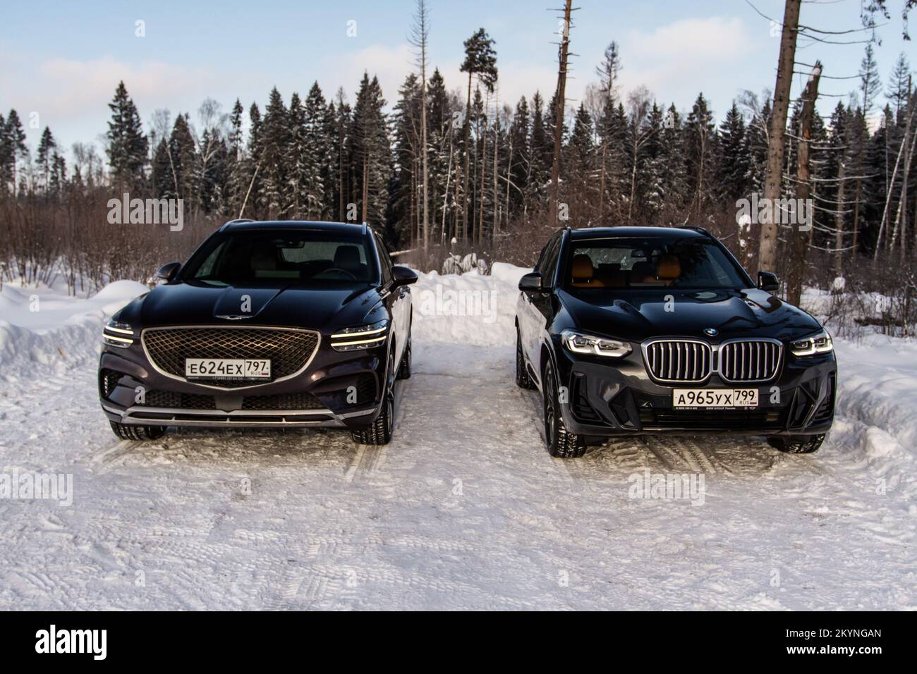 MOSCOW, RUSSIA - FEBRUARY 05, 2022 BMW X3 (G01) and Genesis GV70 (JK1 ...