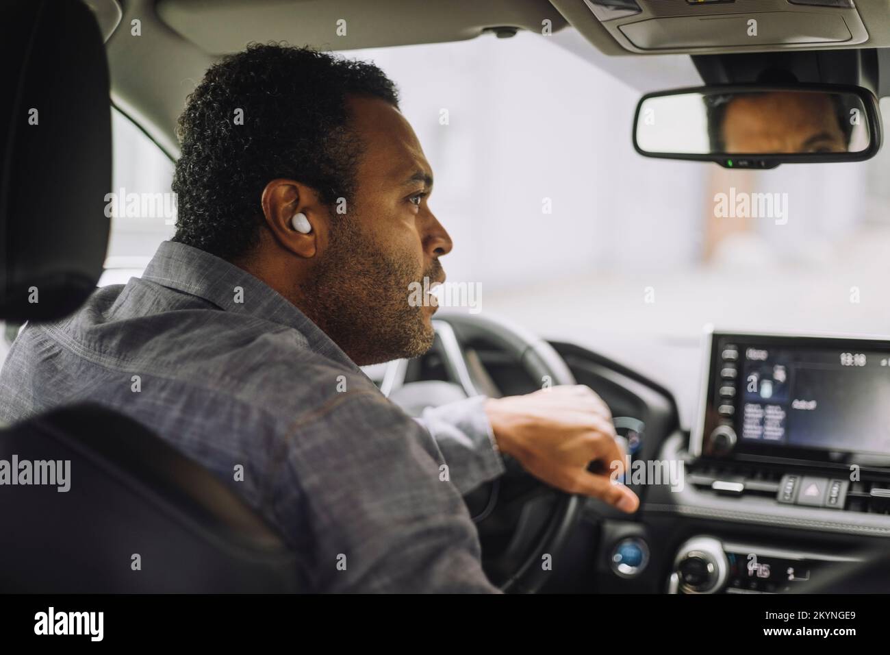 Businessman driving car in hi-res stock photography and images - Alamy
