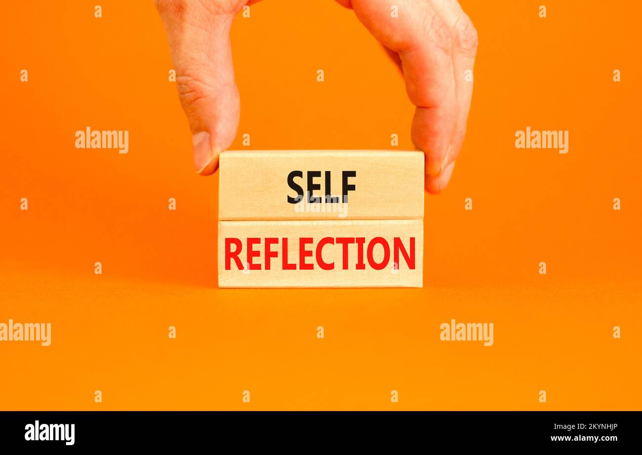 Self reflection symbol. Concept word Self reflection typed on wooden ...