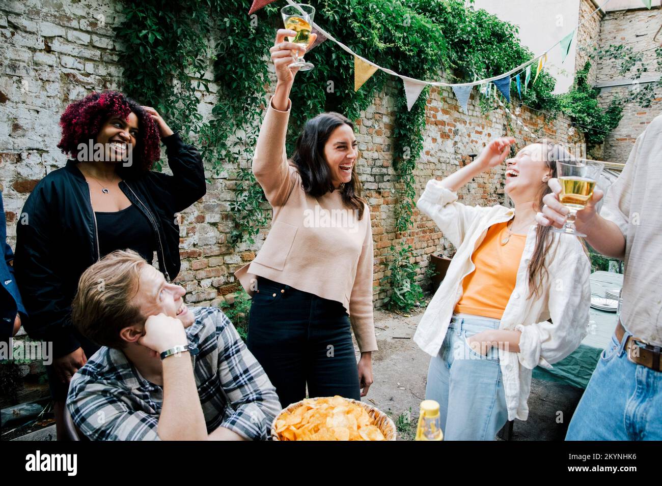Multiracial people celebrating party in hi-res stock photography and ...
