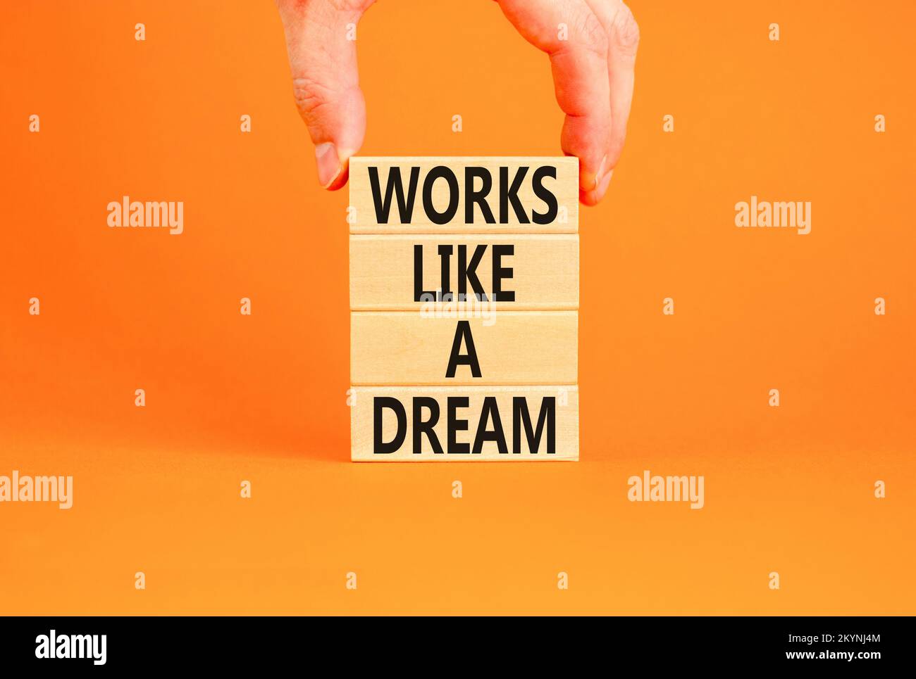 Works like a dream symbol. Concept words Works like a dream on wooden ...