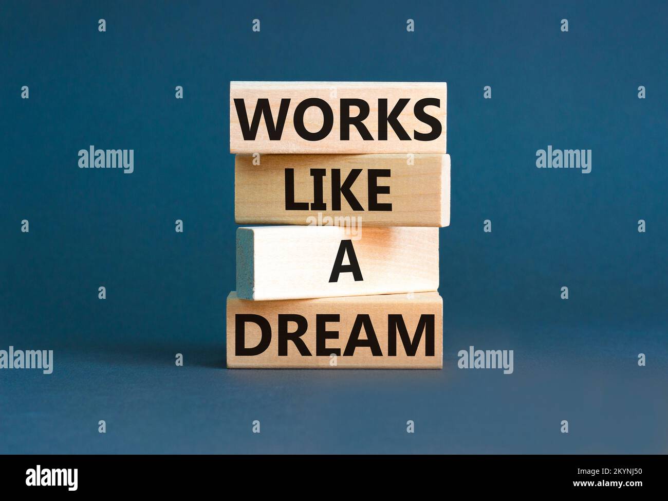 Works like a dream symbol. Concept words Works like a dream on wooden ...