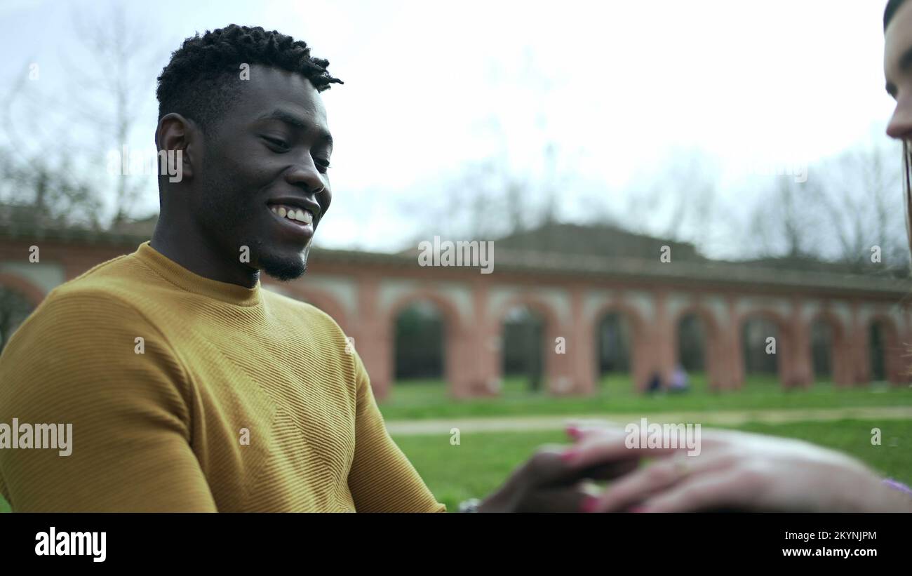 Young interracial couple hands and arms caress and affection together2 ...