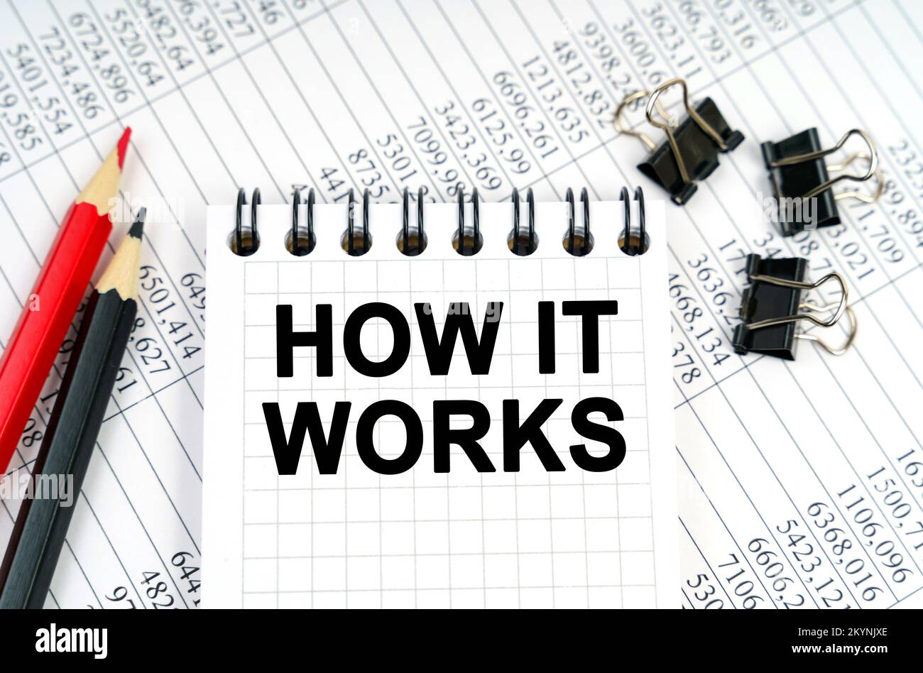 Economy and business concept. On the table are reports, pencils and a ...