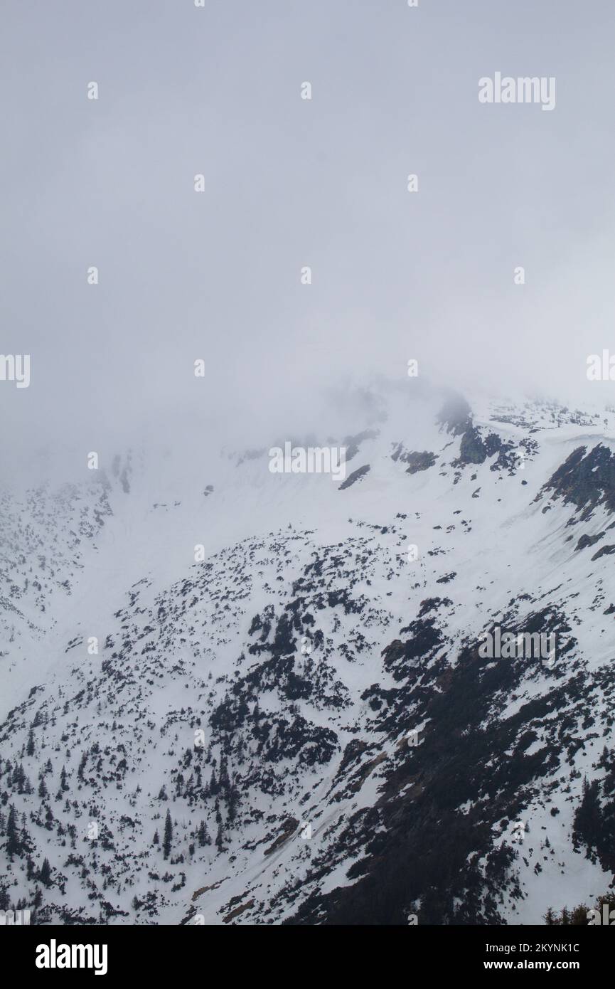Mountain ridge with small cloud cover. Winter time, picture taken in ...
