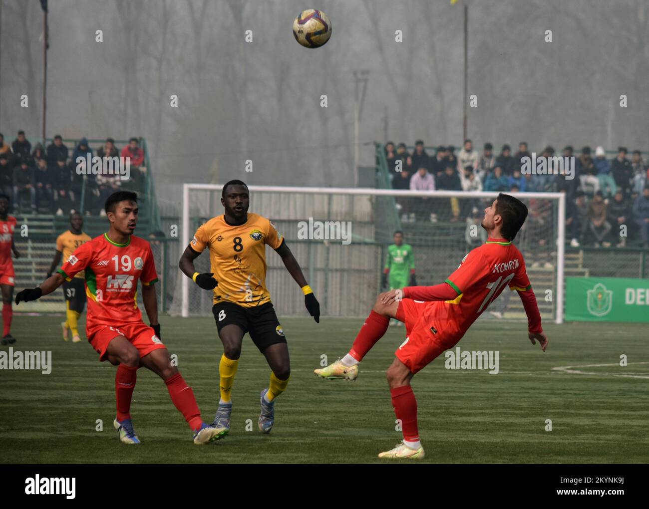 Srinagar, India. 01st Dec, 2022. Komron Tursunov (R) of TRAU FC seen in ...
