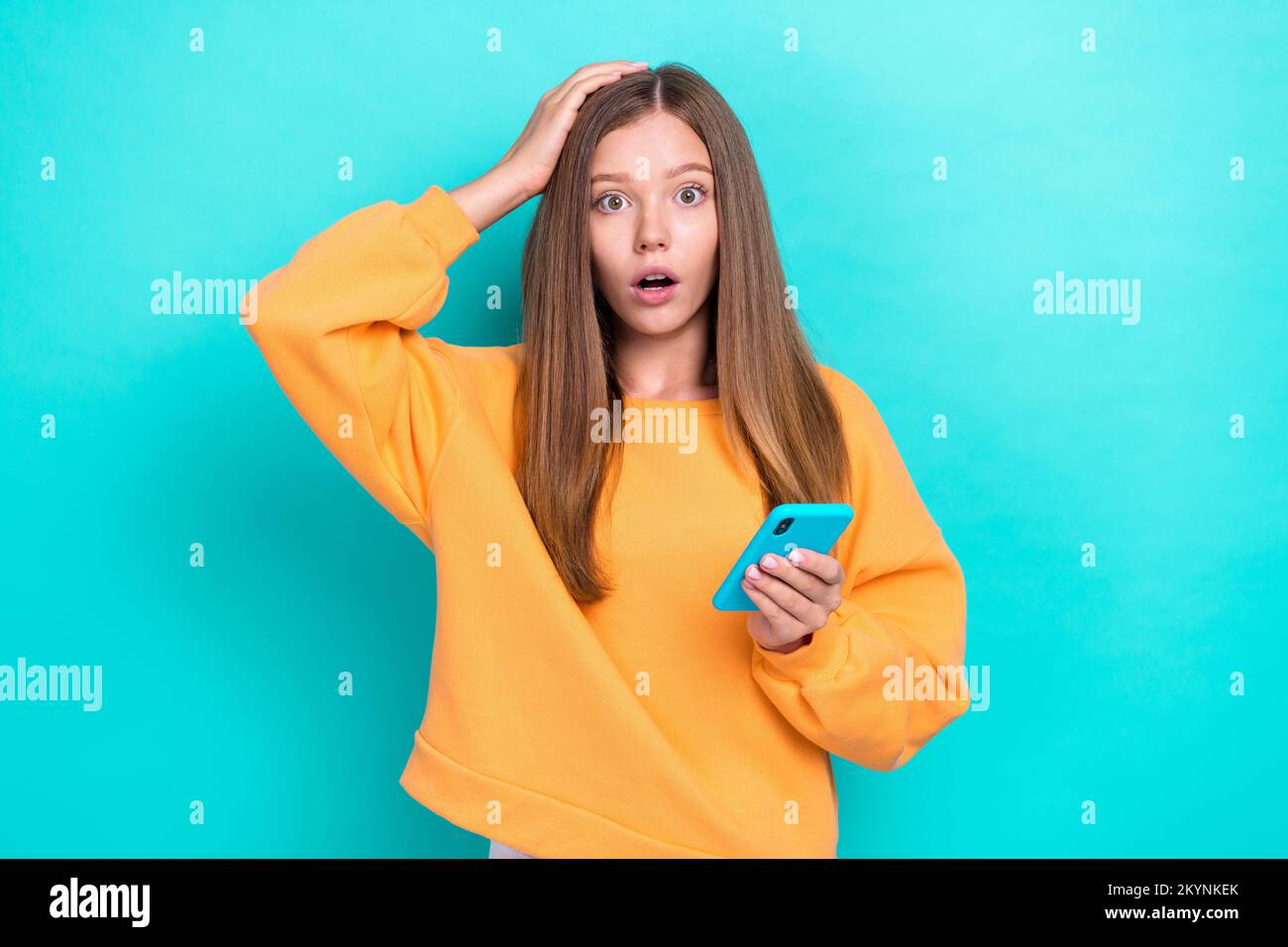 Photo of young funny stressed nervous little girl touch head forgot her ...