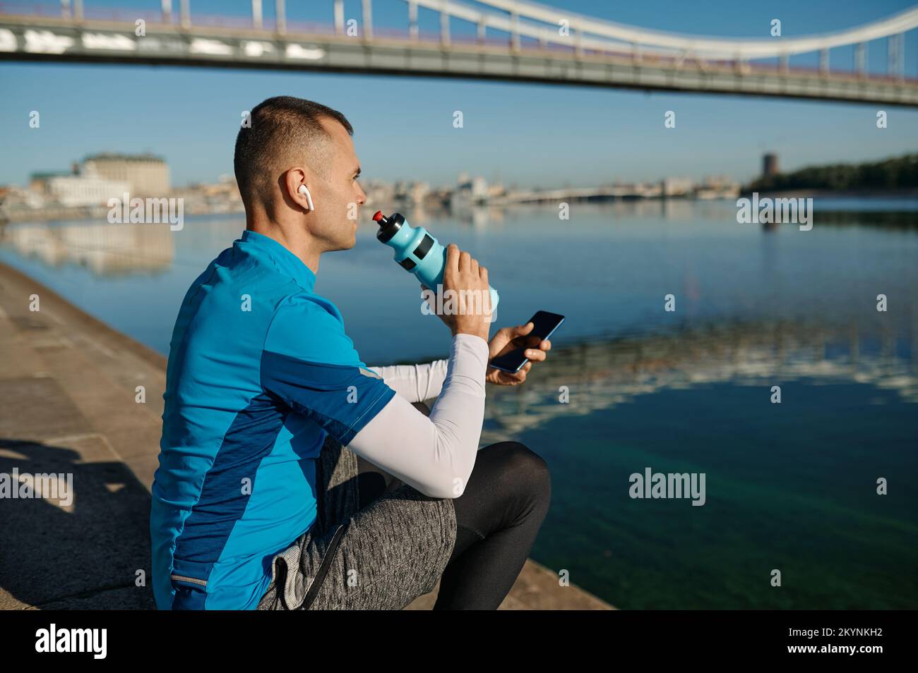 Athletic man rest after running functional workout outdoors Stock Photo ...