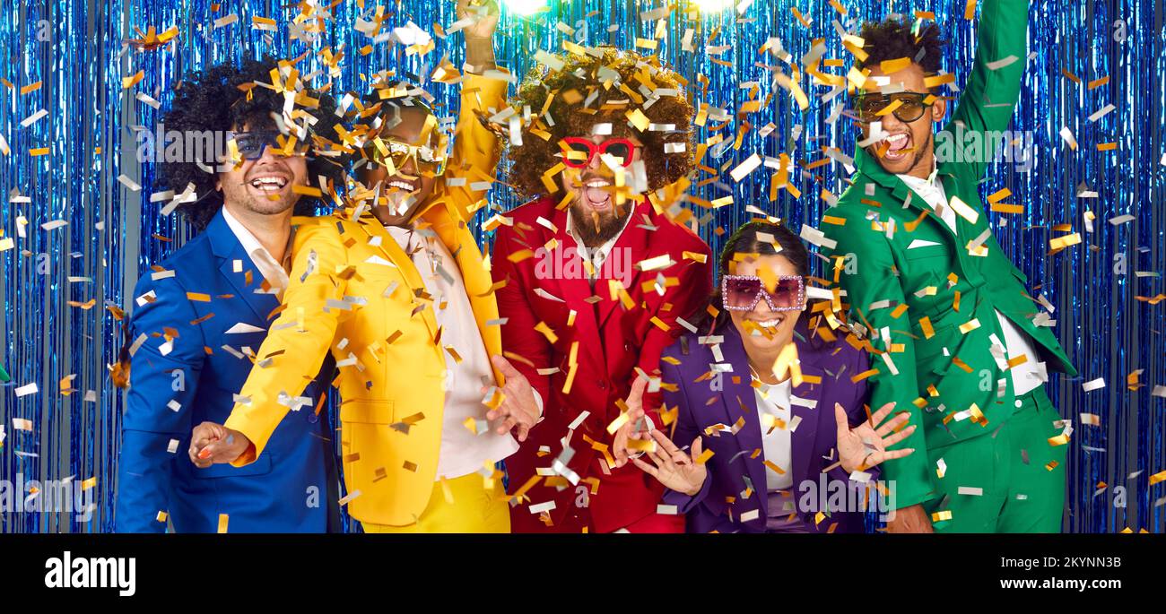 Group of energetic funny friends who are having fun and dancing ...