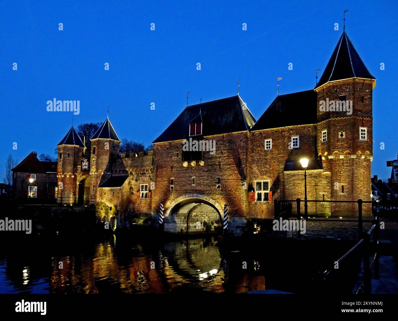 This illuminated gate called Koppelpoort is a medieval gate in the ...