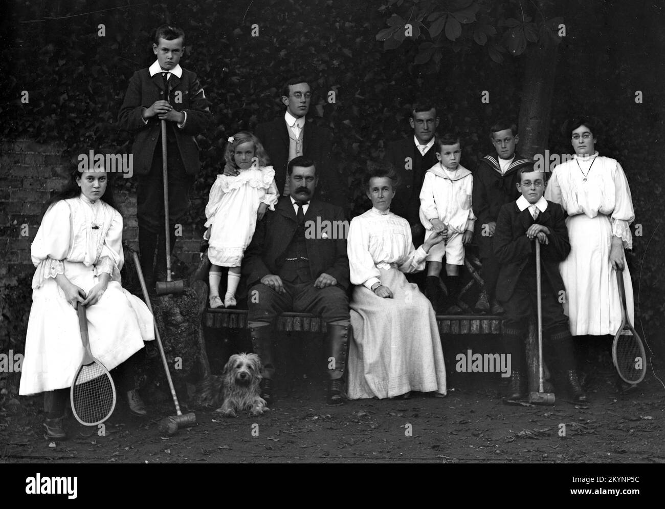 English family with tennis rackets and croquet mallets Britain, 1905 ...